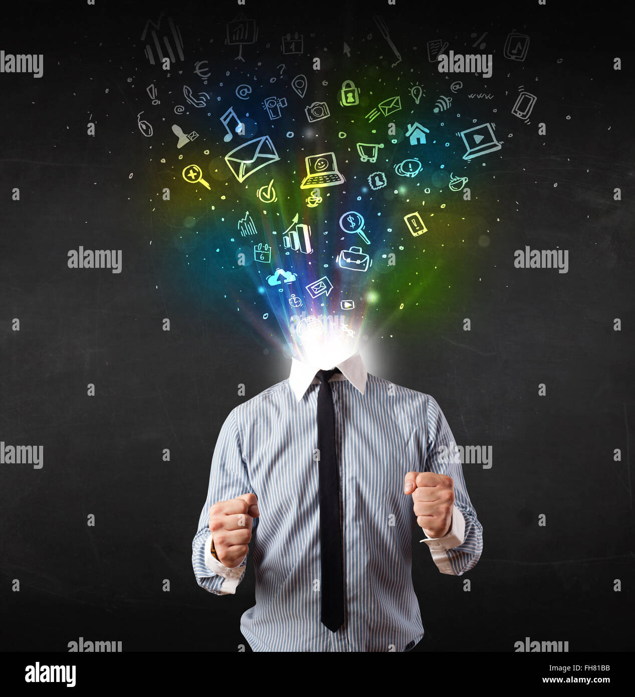 Business man with glowing media icons exploding head Stock Photo - Alamy