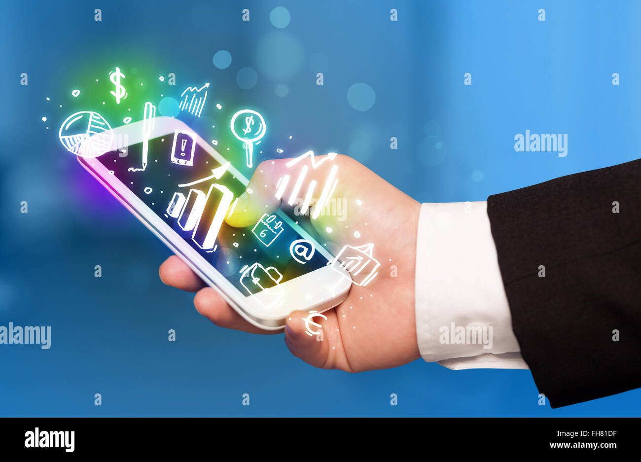 Smartphone with finance and market icons and symbols Stock Photo - Alamy