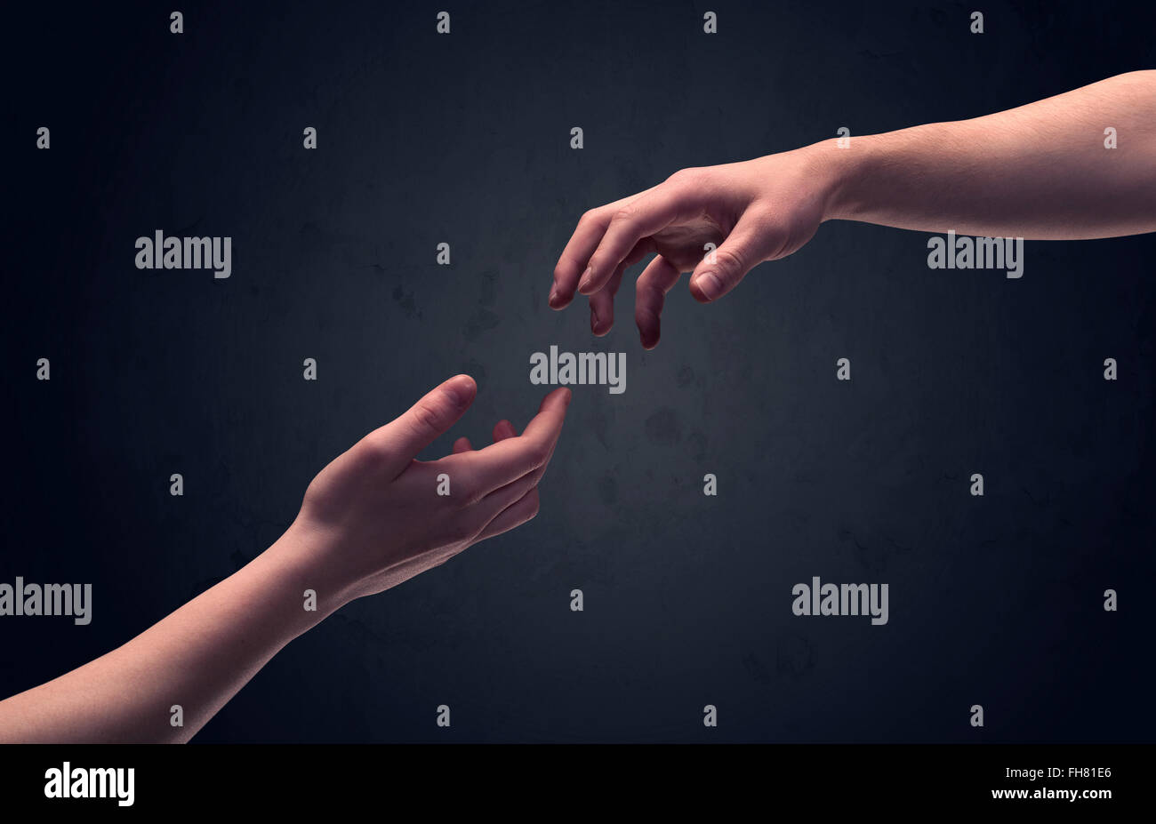 Hands reaching for one another hi-res stock photography and images - Alamy