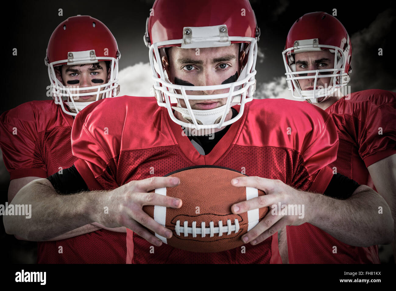 Composite image of american football team Stock Photo - Alamy