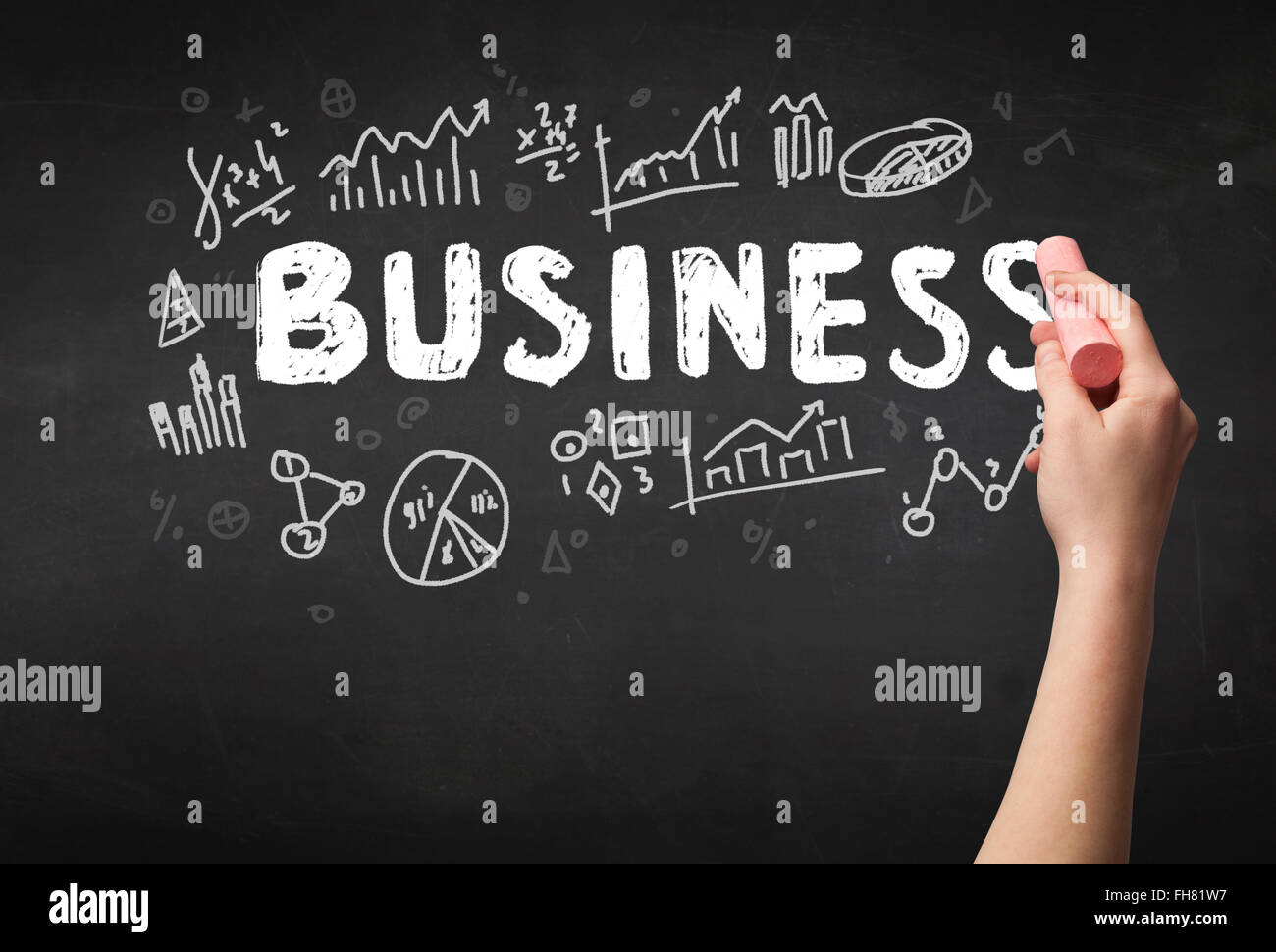 Hand writing business on blackboard Stock Photo - Alamy