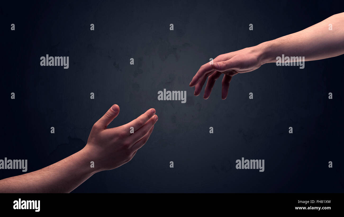 Hand about to touch another one Stock Photo - Alamy