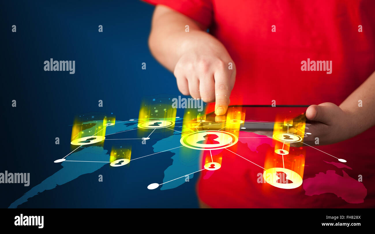 Hand holding tablet device with social network map Stock Photo - Alamy
