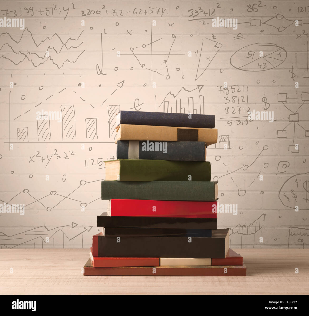 A pile of books with math formulas written in doodle style Stock Photo ...