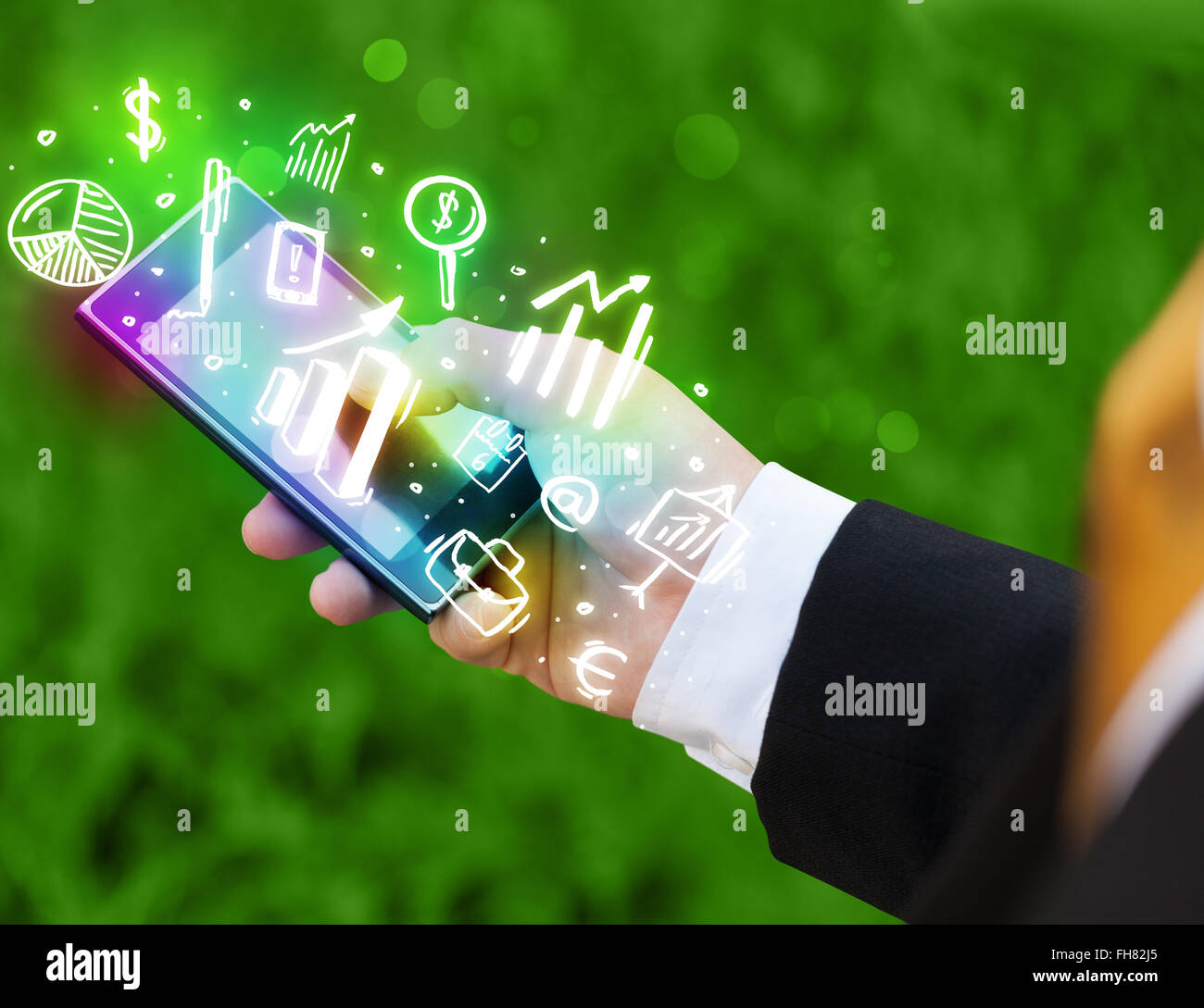 Smartphone with finance and market icons and symbols Stock Photo - Alamy