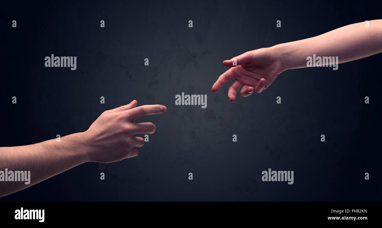 Hand about to touch another one Stock Photo - Alamy