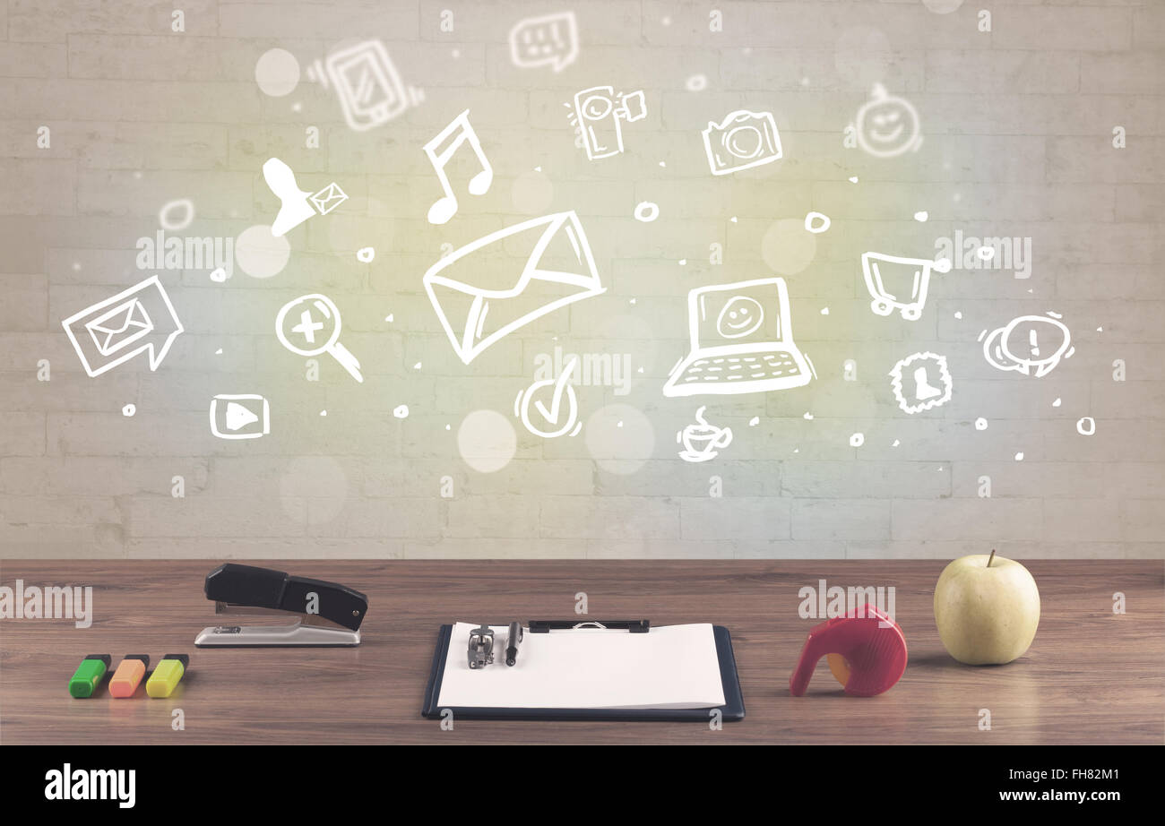 Office desk with communication icons Stock Photo - Alamy