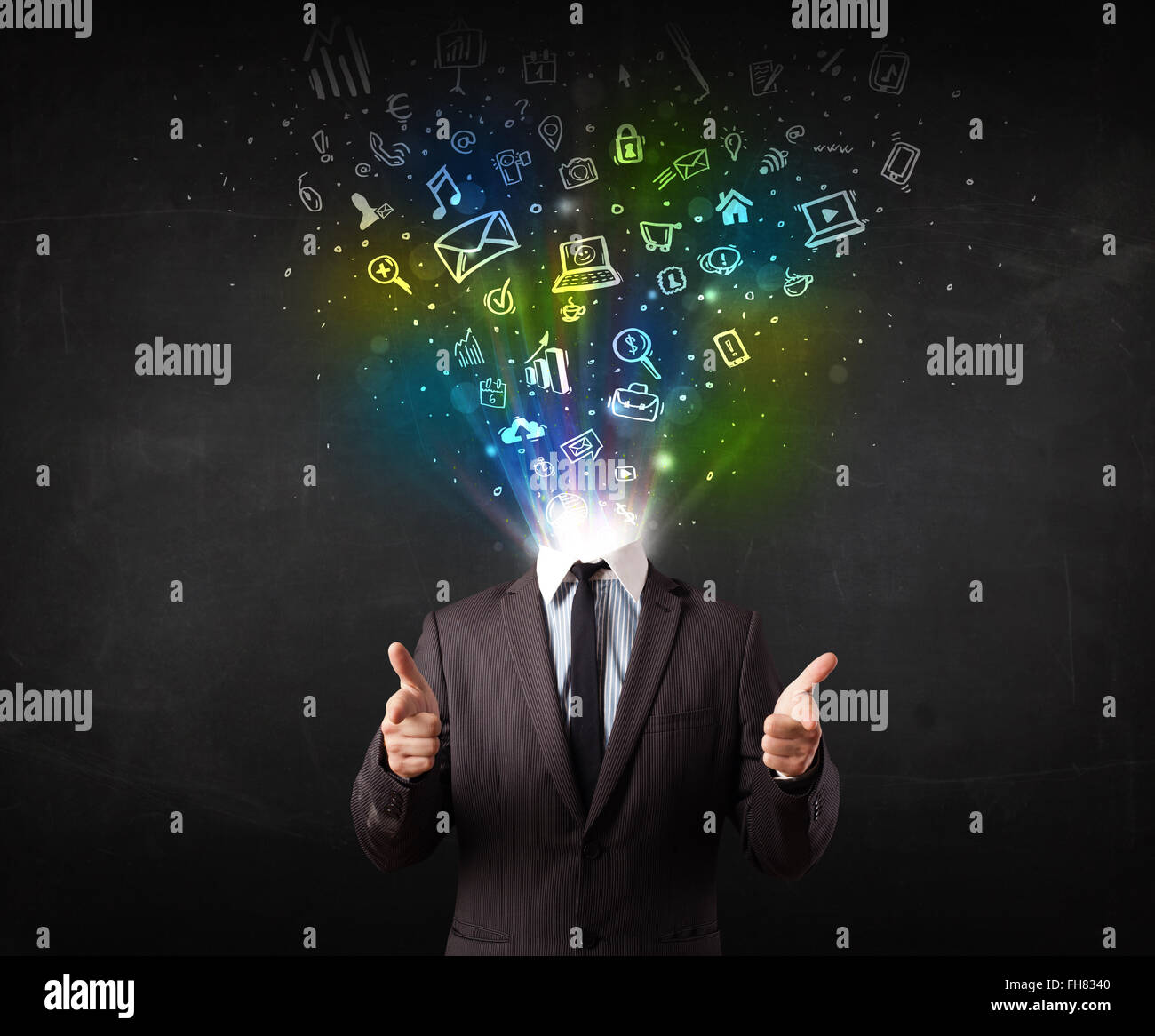 Business man with glowing media icons exploding head Stock Photo - Alamy