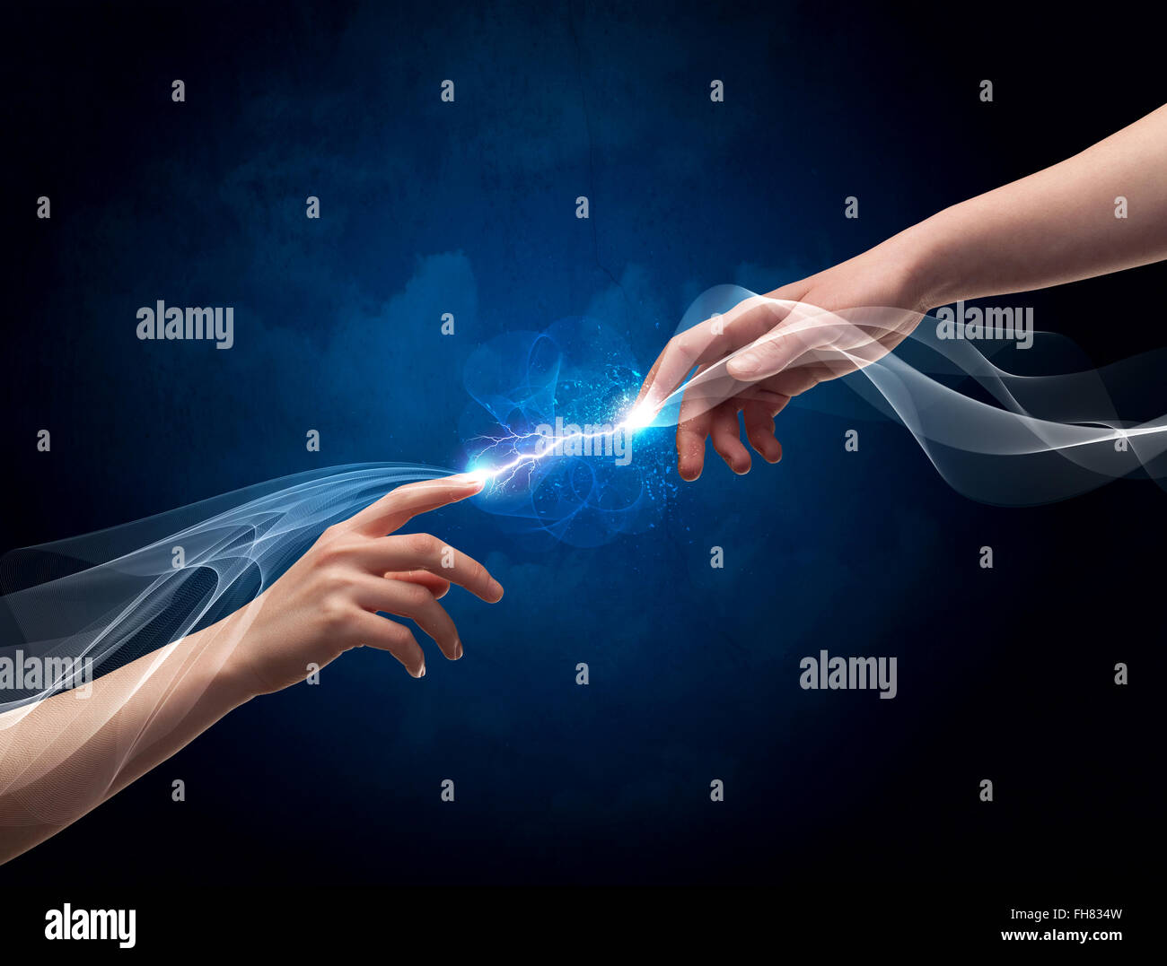 Hands connecting through fingers in space Stock Photo - Alamy