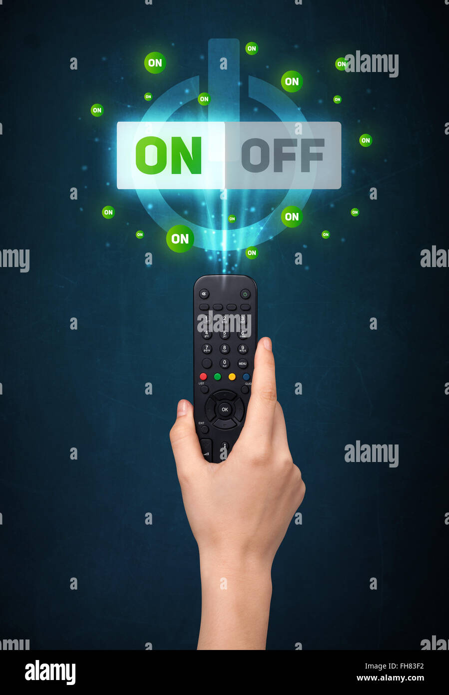 Hand with remote control and on-off signals Stock Photo - Alamy