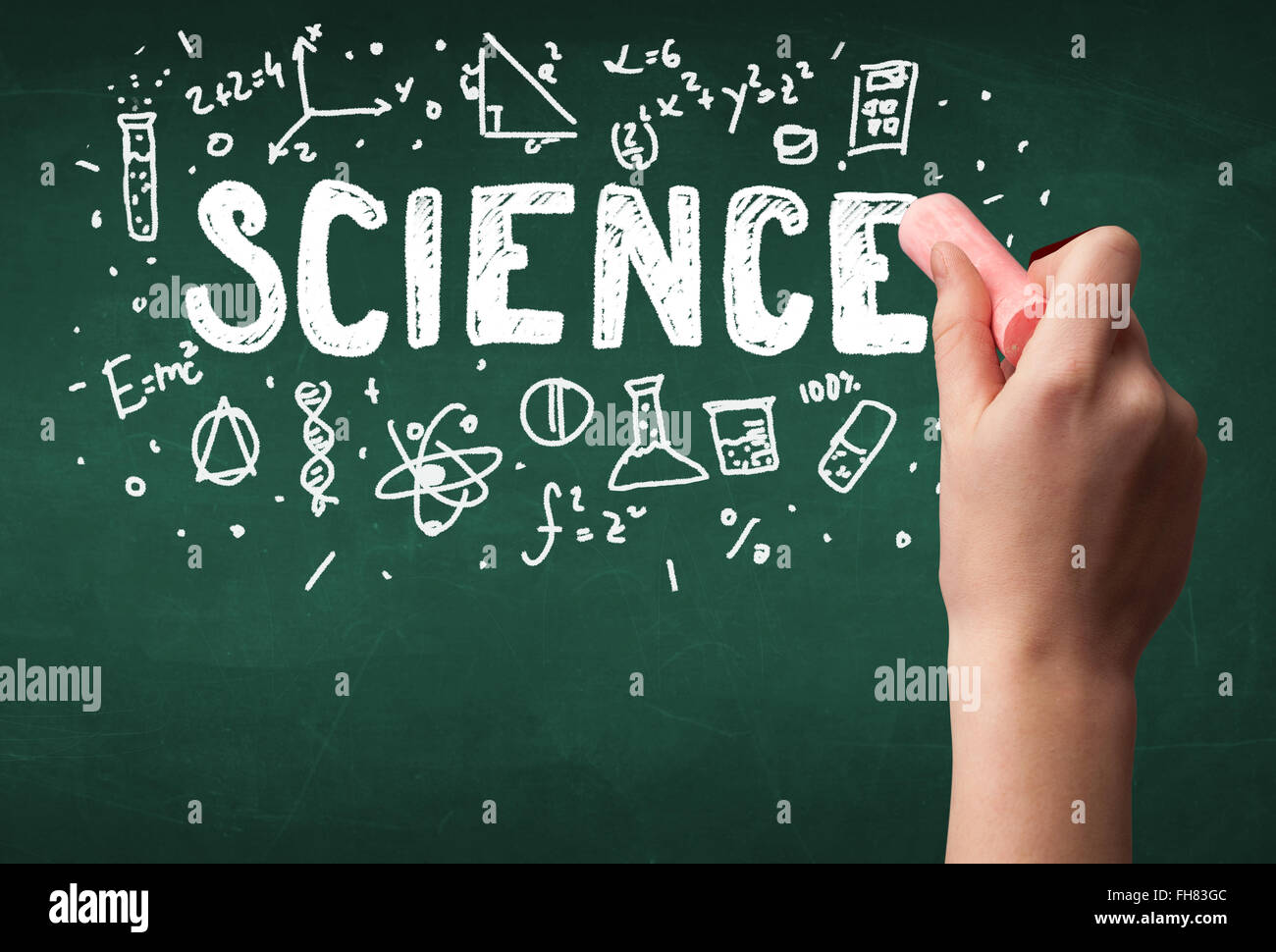 Mature science person drawing on board Stock Photo - Alamy