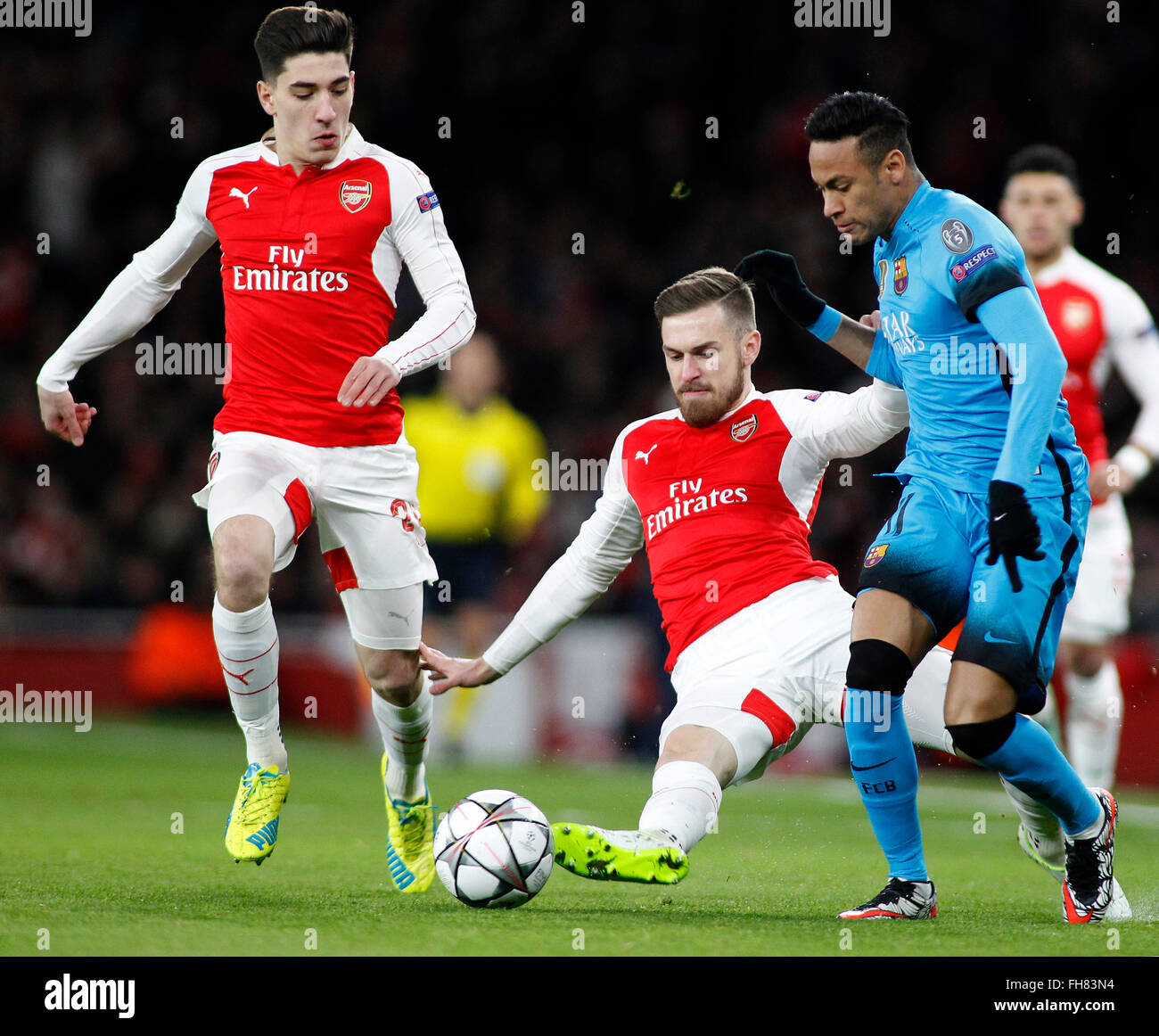 London, UK. 23rd Feb, 2016. Aaron Ramsey of Arsenal and Neymar of ...