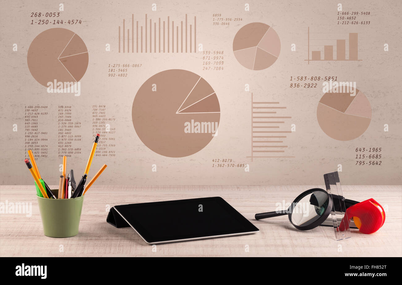 Pie chart graph office desk Stock Photo - Alamy