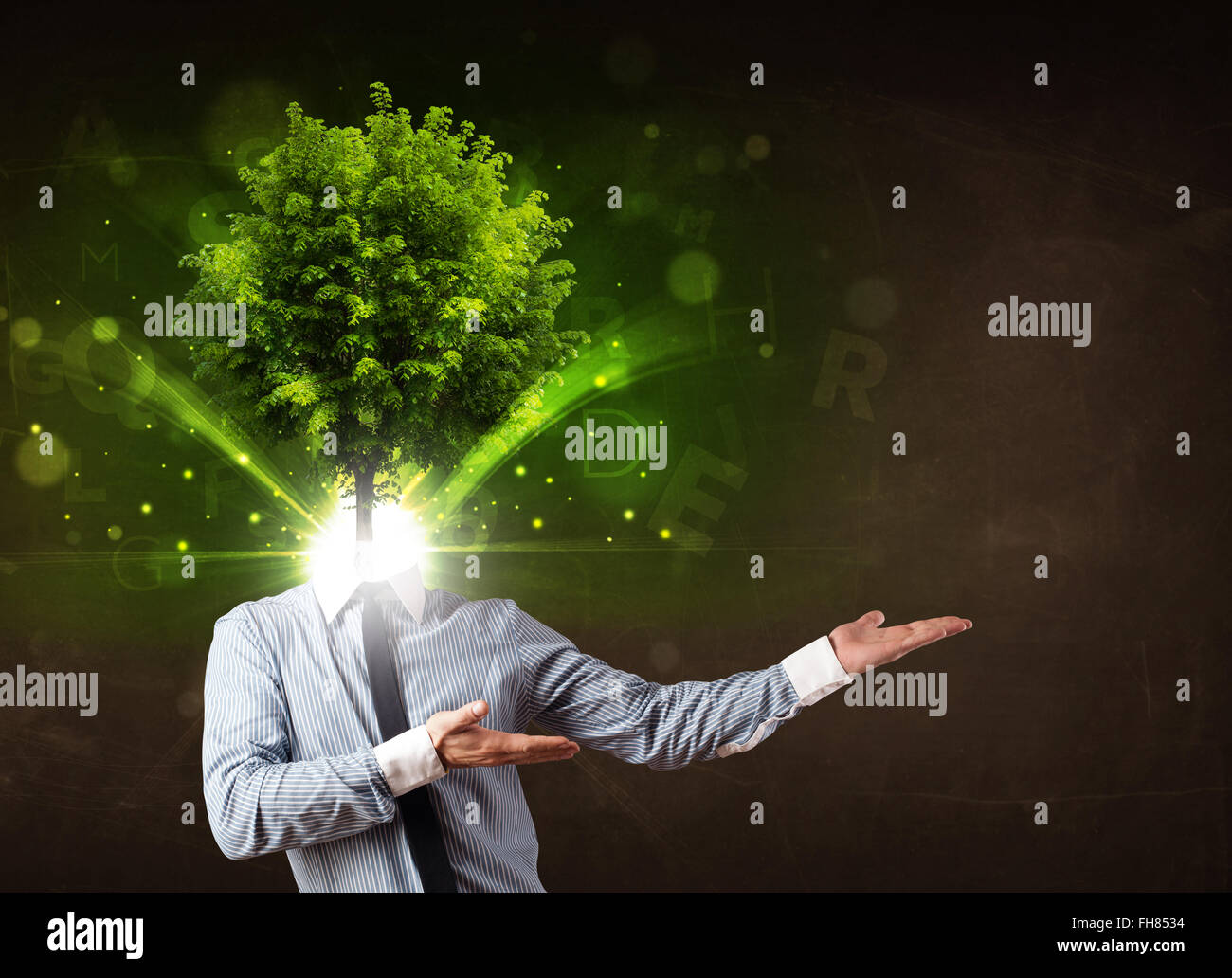 Man with green tree head concept Stock Photo - Alamy