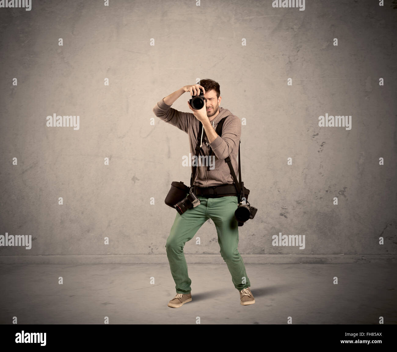 Hobby photographer holding camera Stock Photo - Alamy