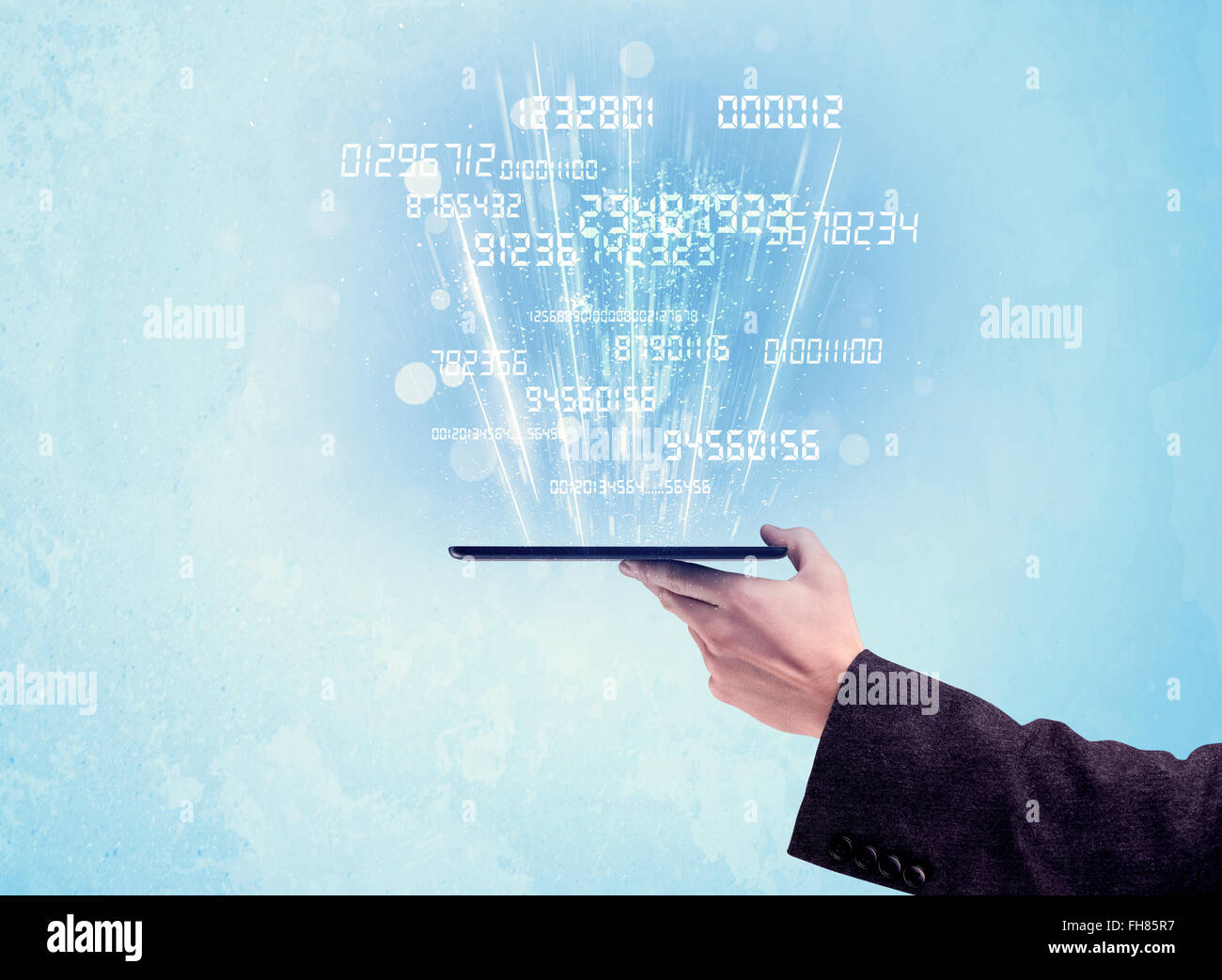 Hand holding phone with digital numbers Stock Photo - Alamy