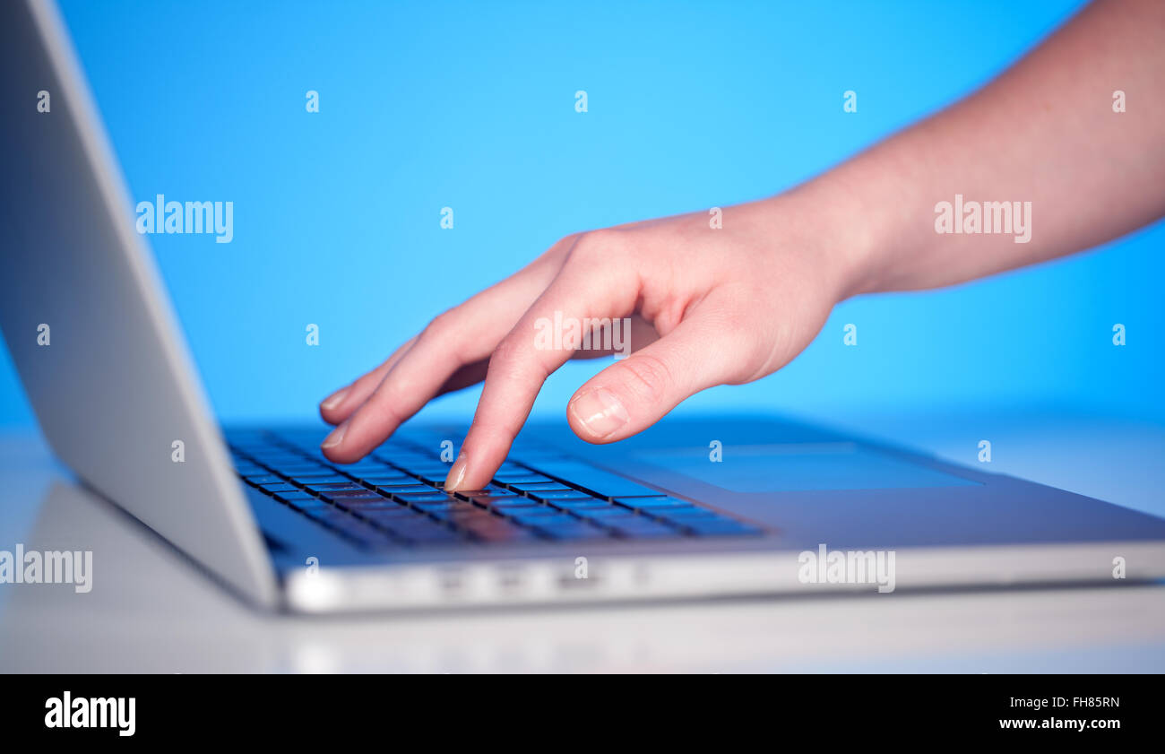Close up of hand pressing keyboard buttons Stock Photo - Alamy