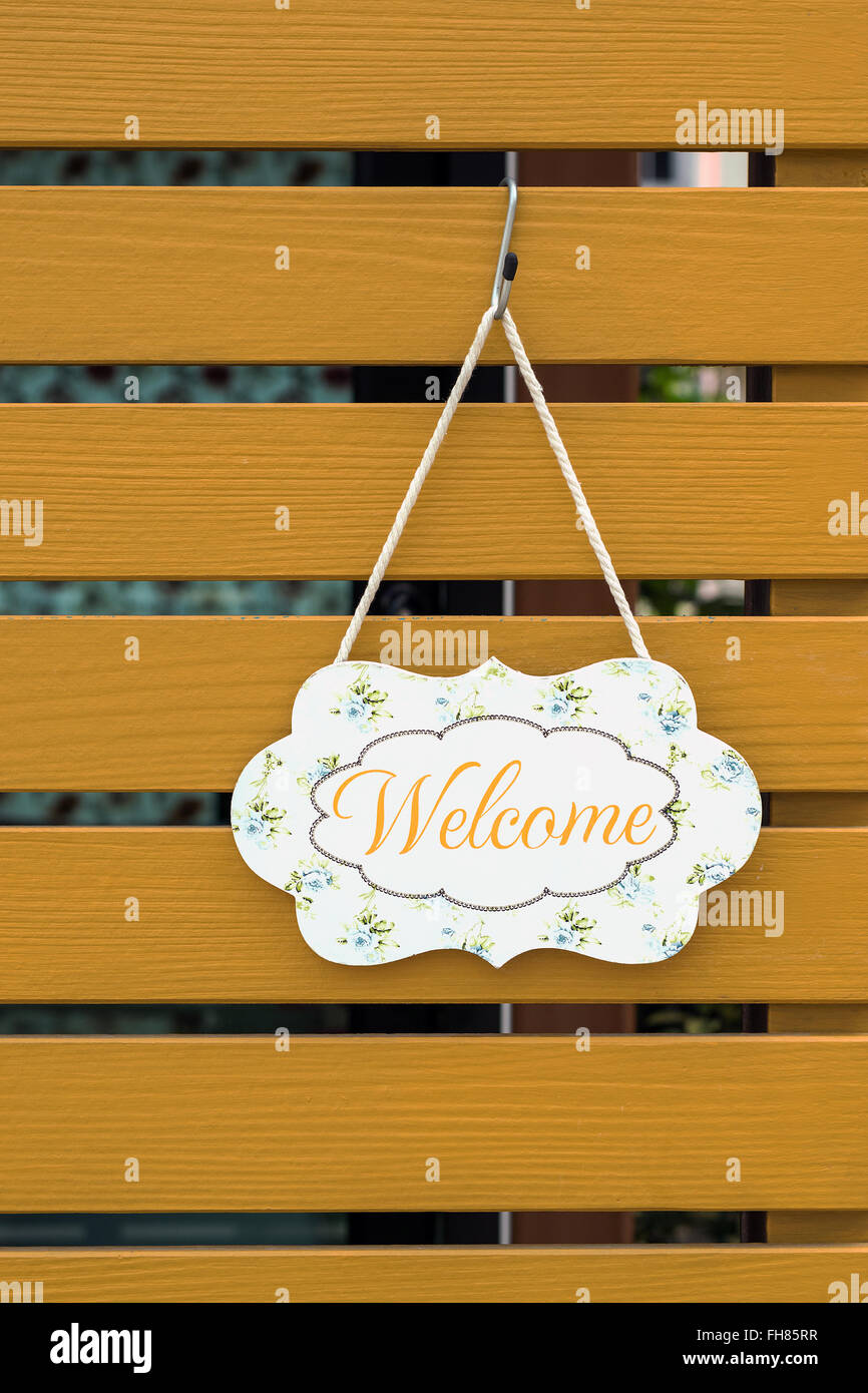 Welcome sign board for a welcome sign hanging in front of shops or ...