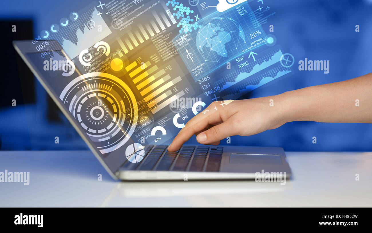 Modern notebook computer with future technology symbols Stock Photo - Alamy