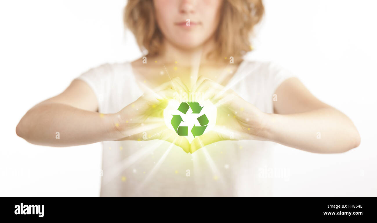 Hands creating a form with recycling sign Stock Photo - Alamy