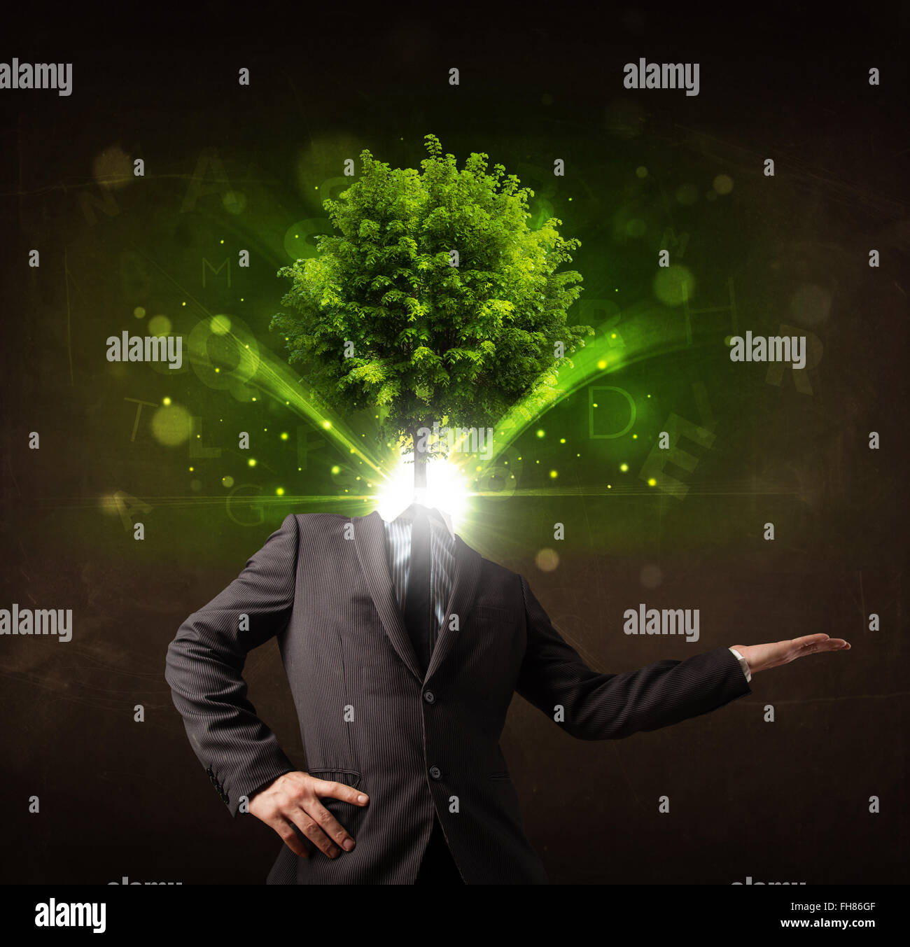 Man with green tree head concept Stock Photo - Alamy