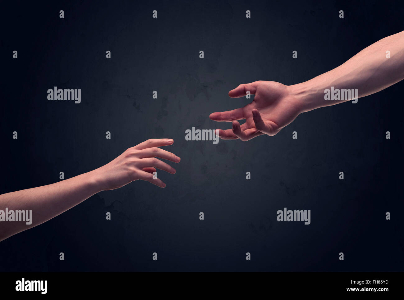 Hand about to touch another one Stock Photo - Alamy