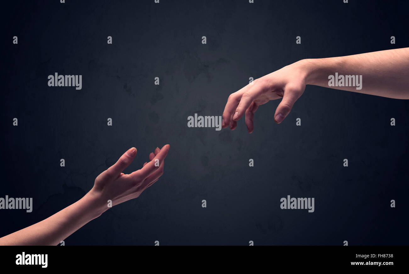 Hand about to touch another one Stock Photo - Alamy