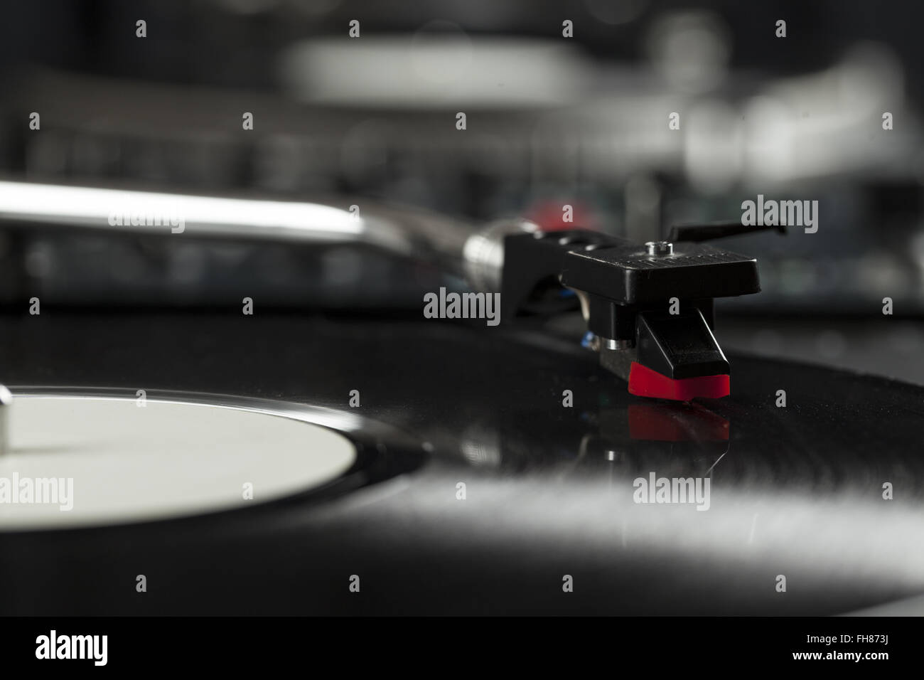 Turntable playing vinyl close up with needle on the record Stock Photo ...