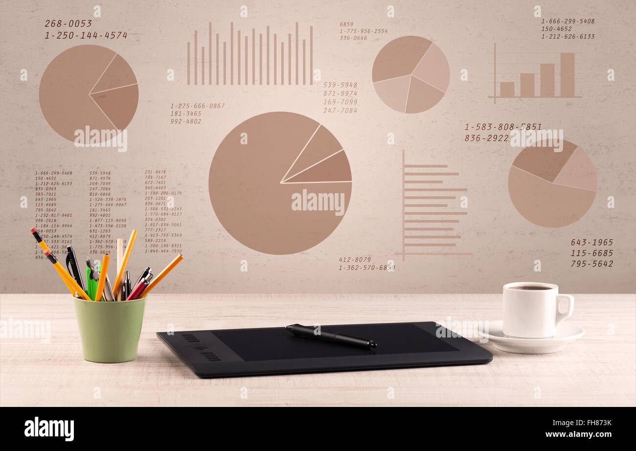 Pie chart graph office desk Stock Photo - Alamy