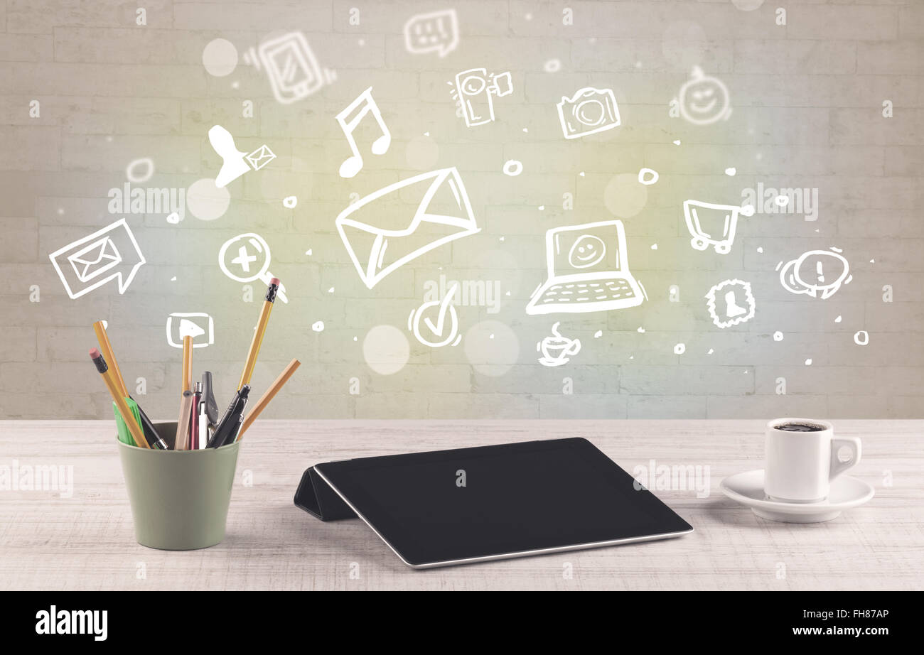 Office desk with communication icons Stock Photo - Alamy