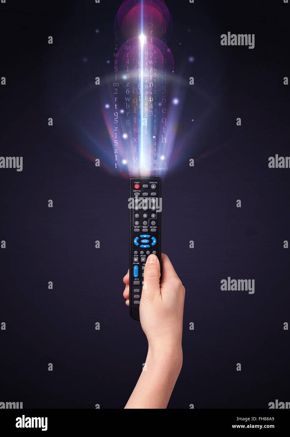 Hand with remote control and shining numbers Stock Photo - Alamy