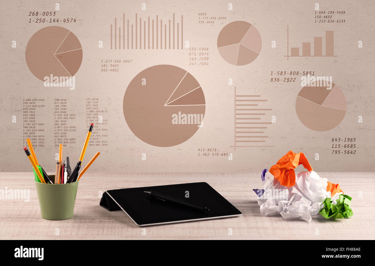 Pie chart graph office desk Stock Photo - Alamy