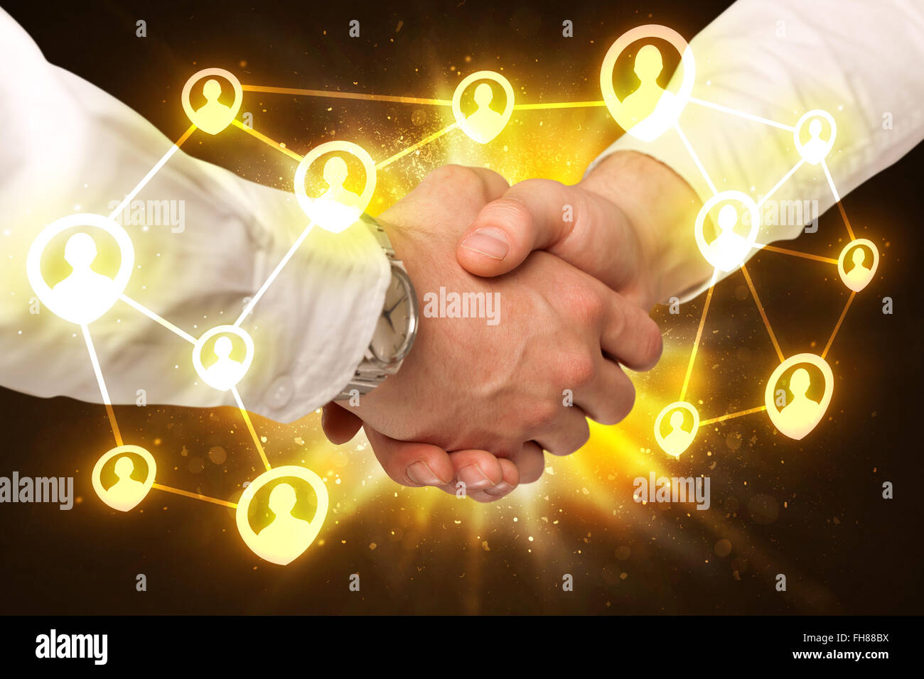 Social netwok connection handshake Stock Photo - Alamy
