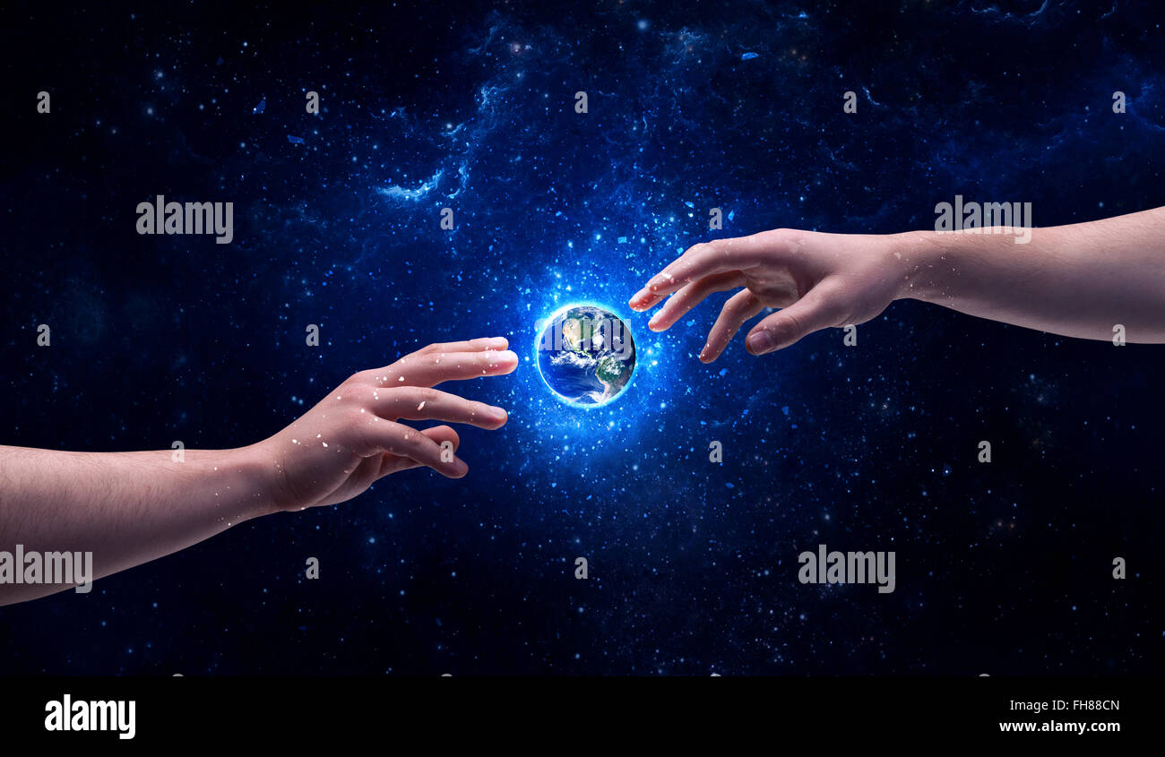 Hands in space touching planet earth Stock Photo - Alamy