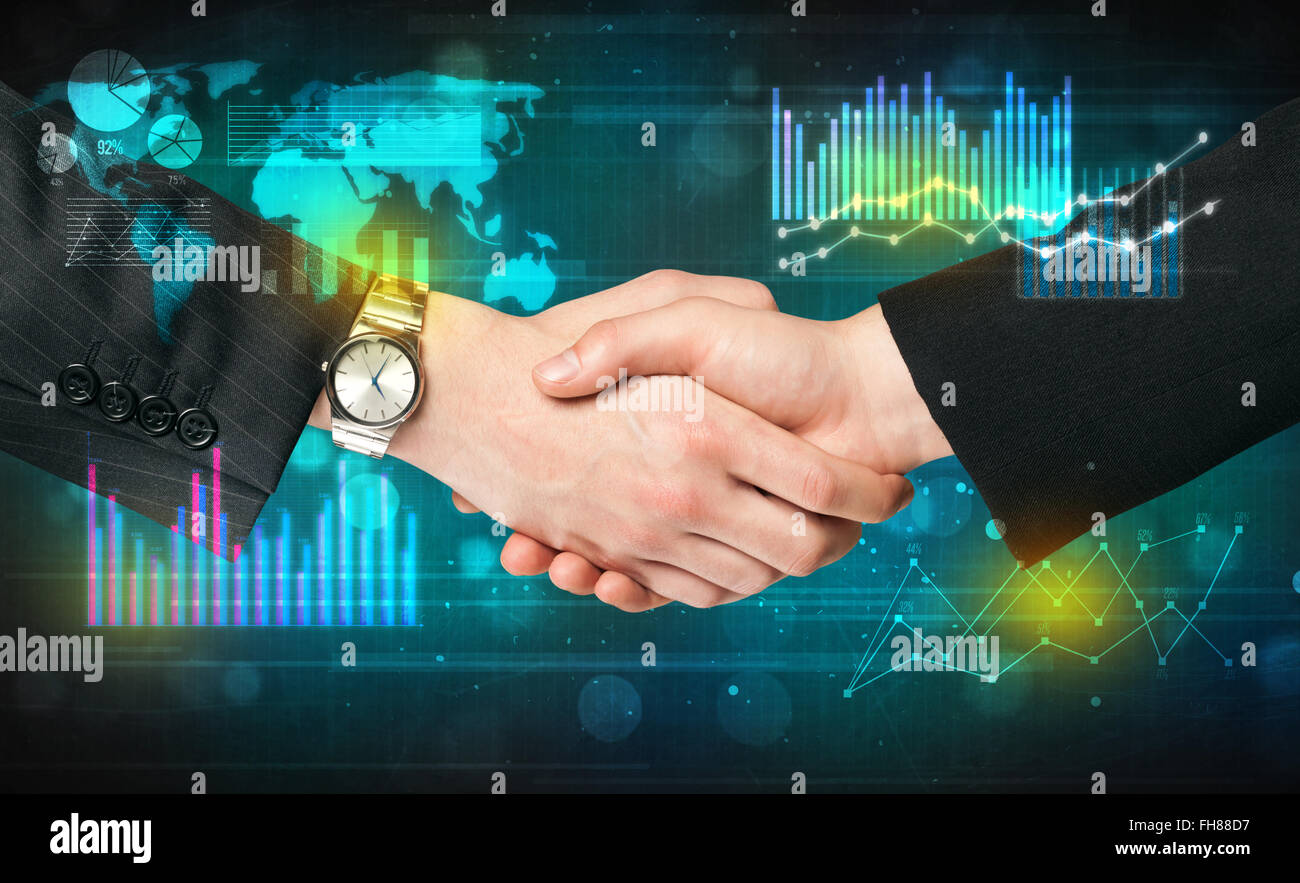 Handshake with diagrams Stock Photo - Alamy
