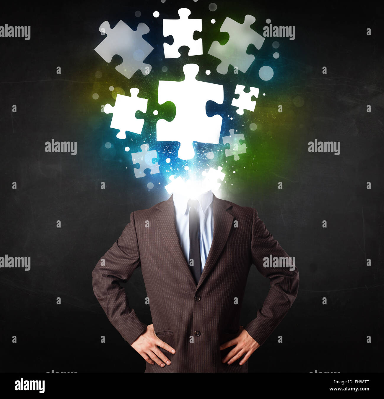 Character in suit with puzzle head concept Stock Photo - Alamy