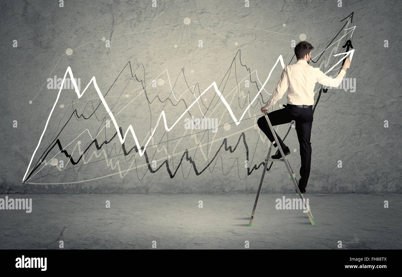 Man on ladder drawing lines Stock Photo - Alamy