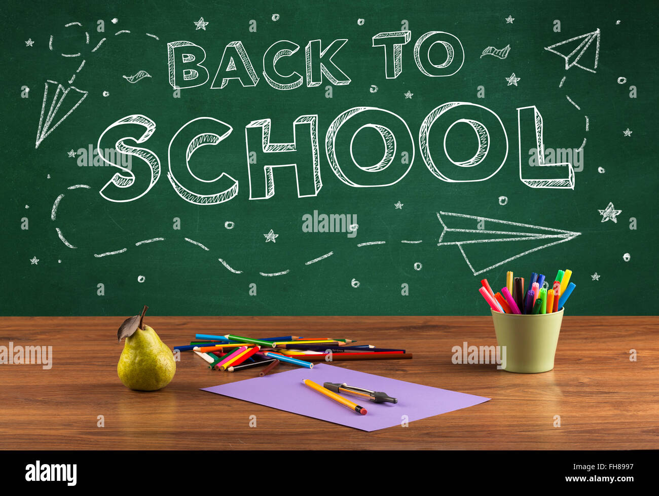 Back to school blackboard and student desk Stock Photo - Alamy