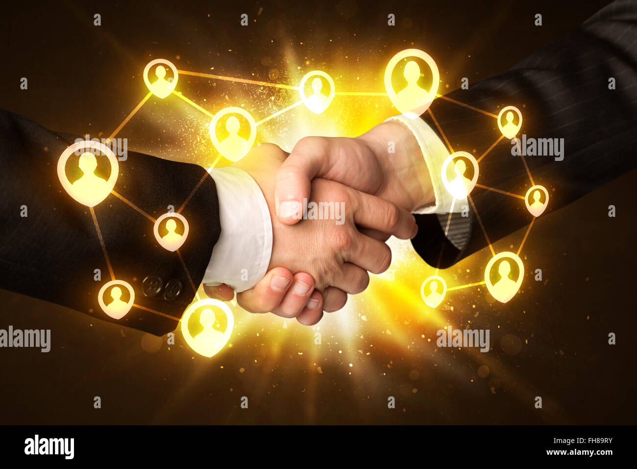 Social netwok connection handshake Stock Photo - Alamy