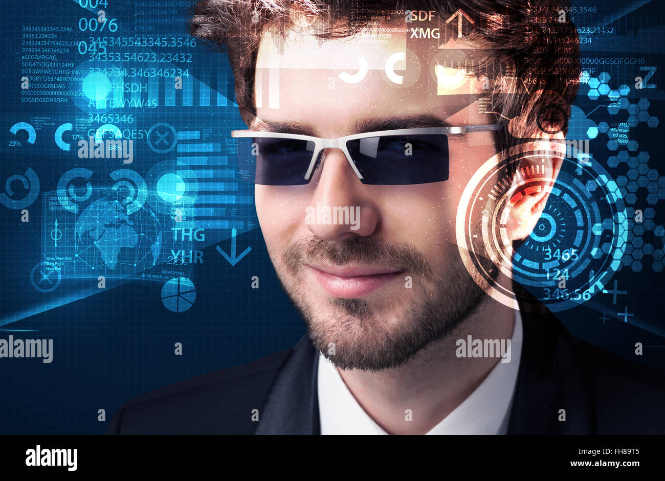 Young man looking with futuristic smart high tech glasses Stock Photo ...