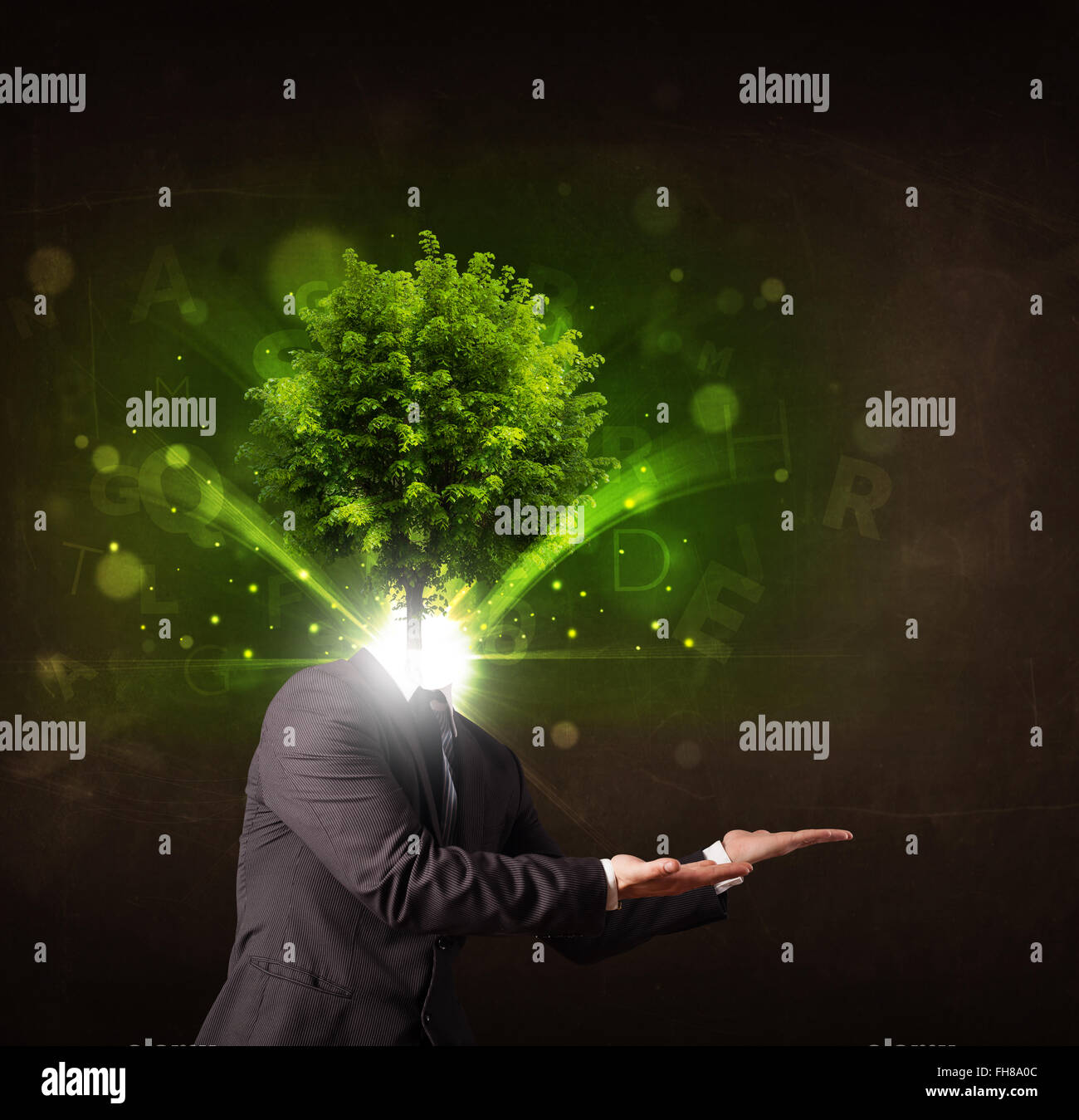 Man with green tree head concept Stock Photo - Alamy