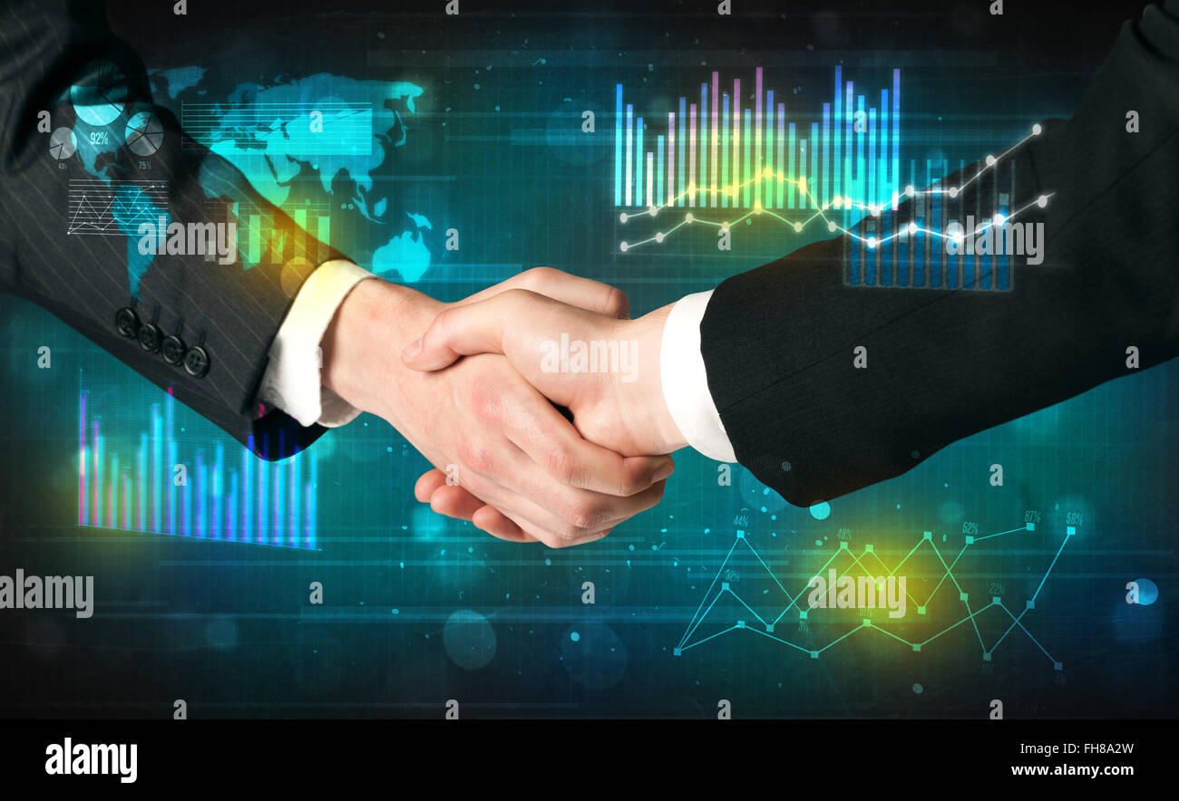 Handshake with diagrams Stock Photo - Alamy