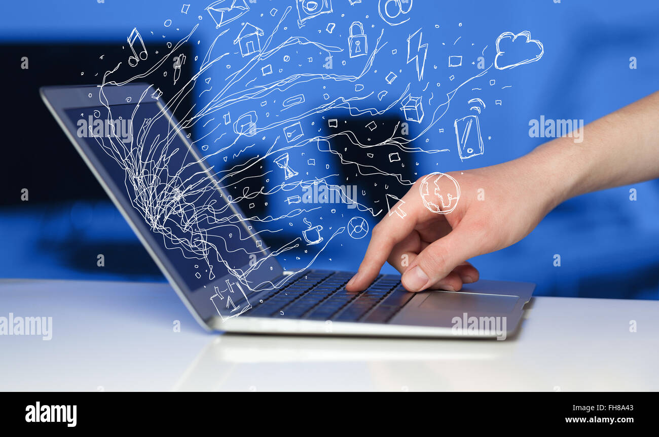 Man pressing notebook laptop computer with doodle icon cloud symbols ...