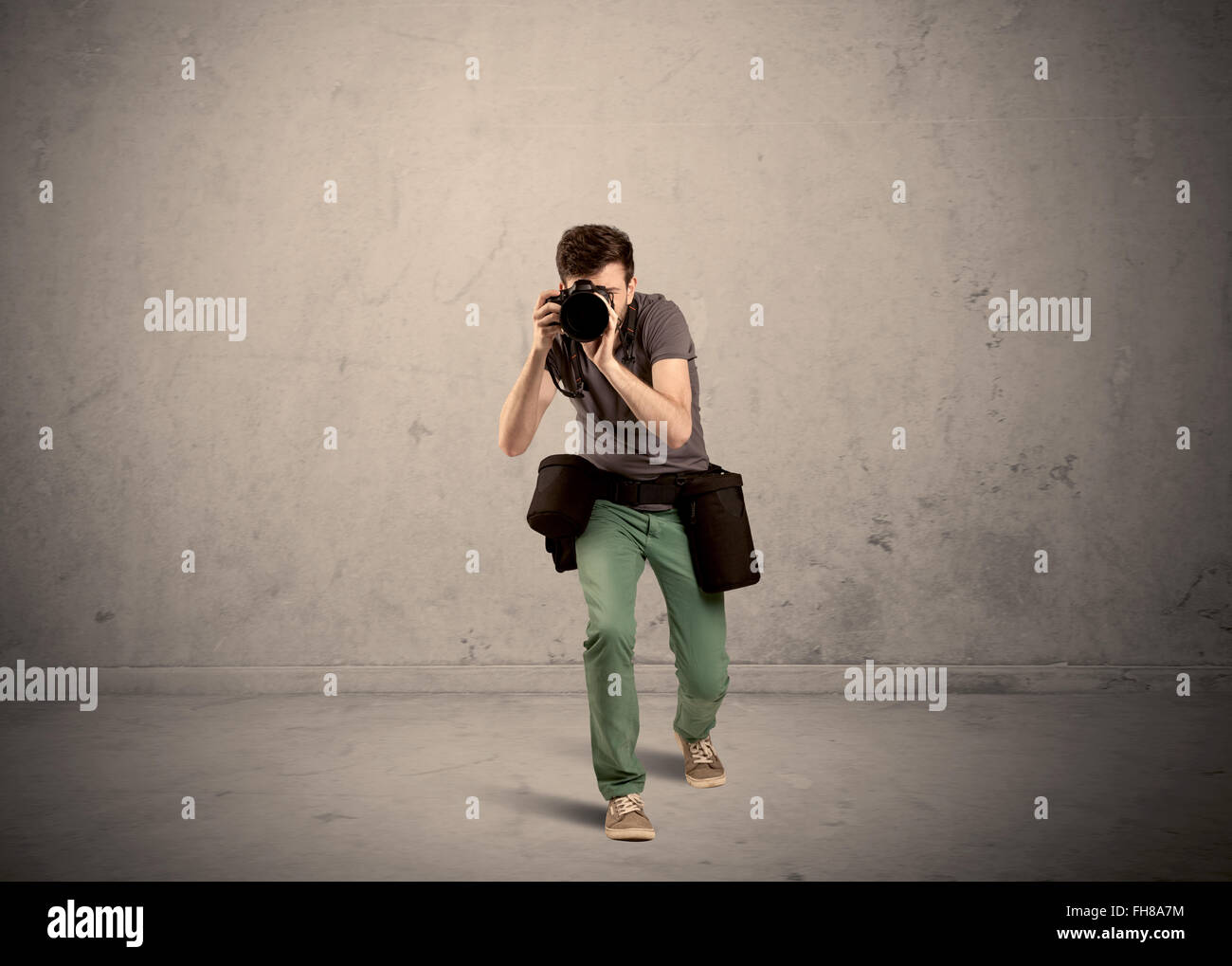 Hobby photographer holding camera Stock Photo - Alamy