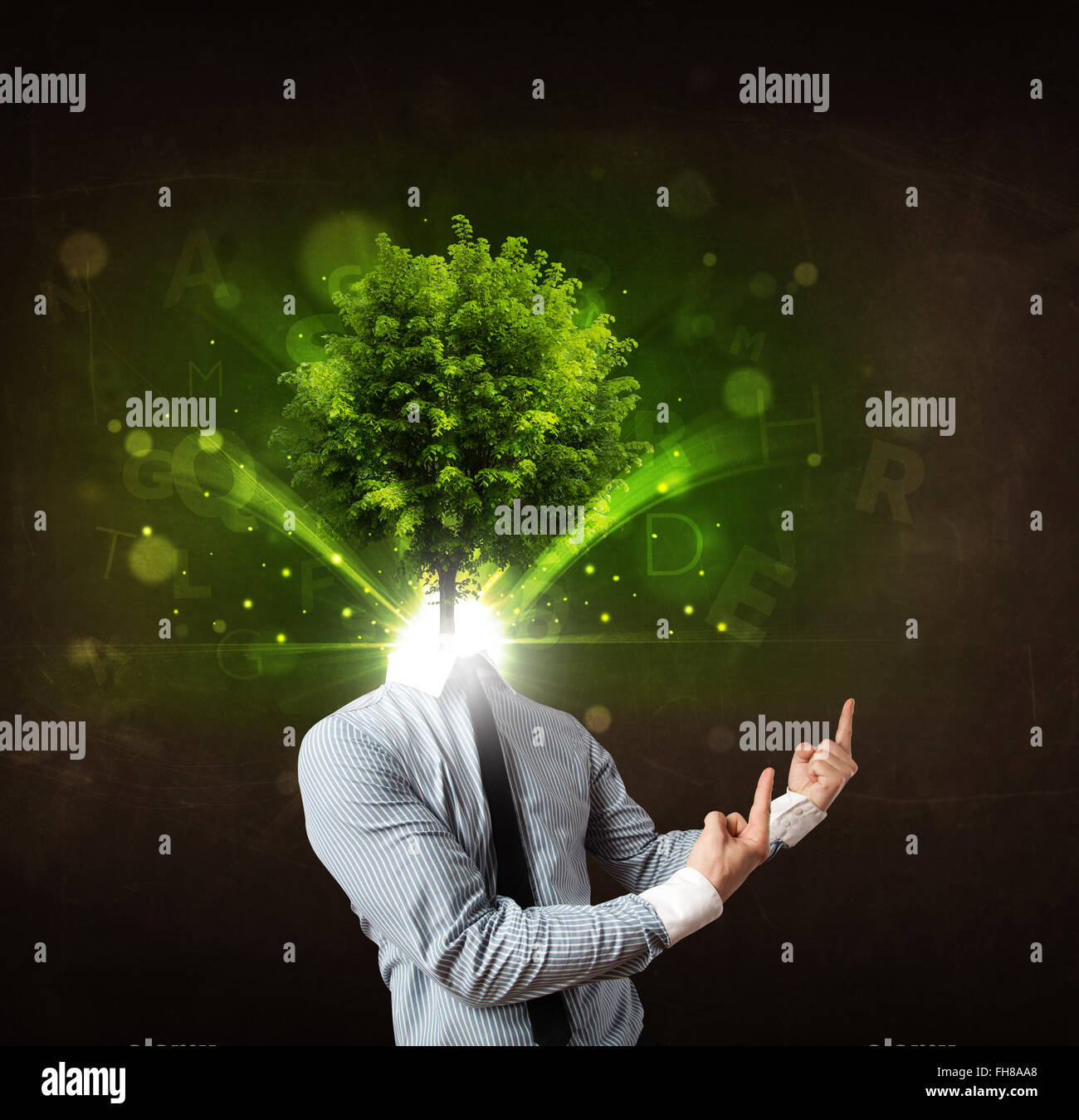Man with green tree head concept Stock Photo - Alamy