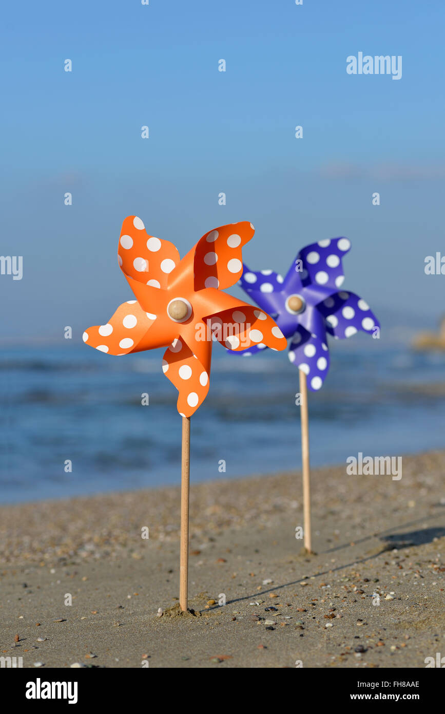 Pinwheel beach toy hi-res stock photography and images - Alamy