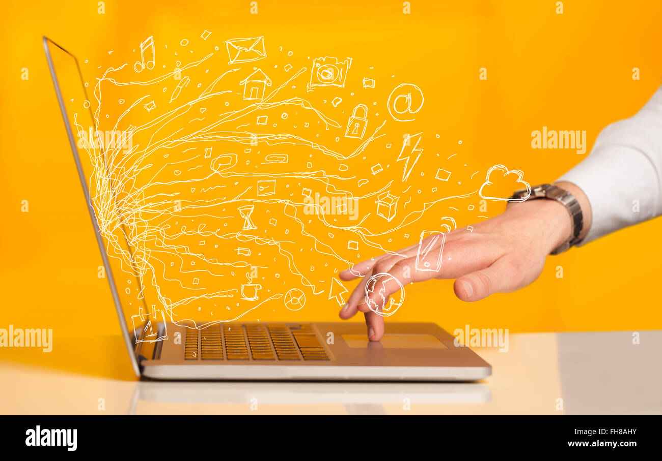 Man pressing notebook laptop computer with doodle icon cloud symbols ...