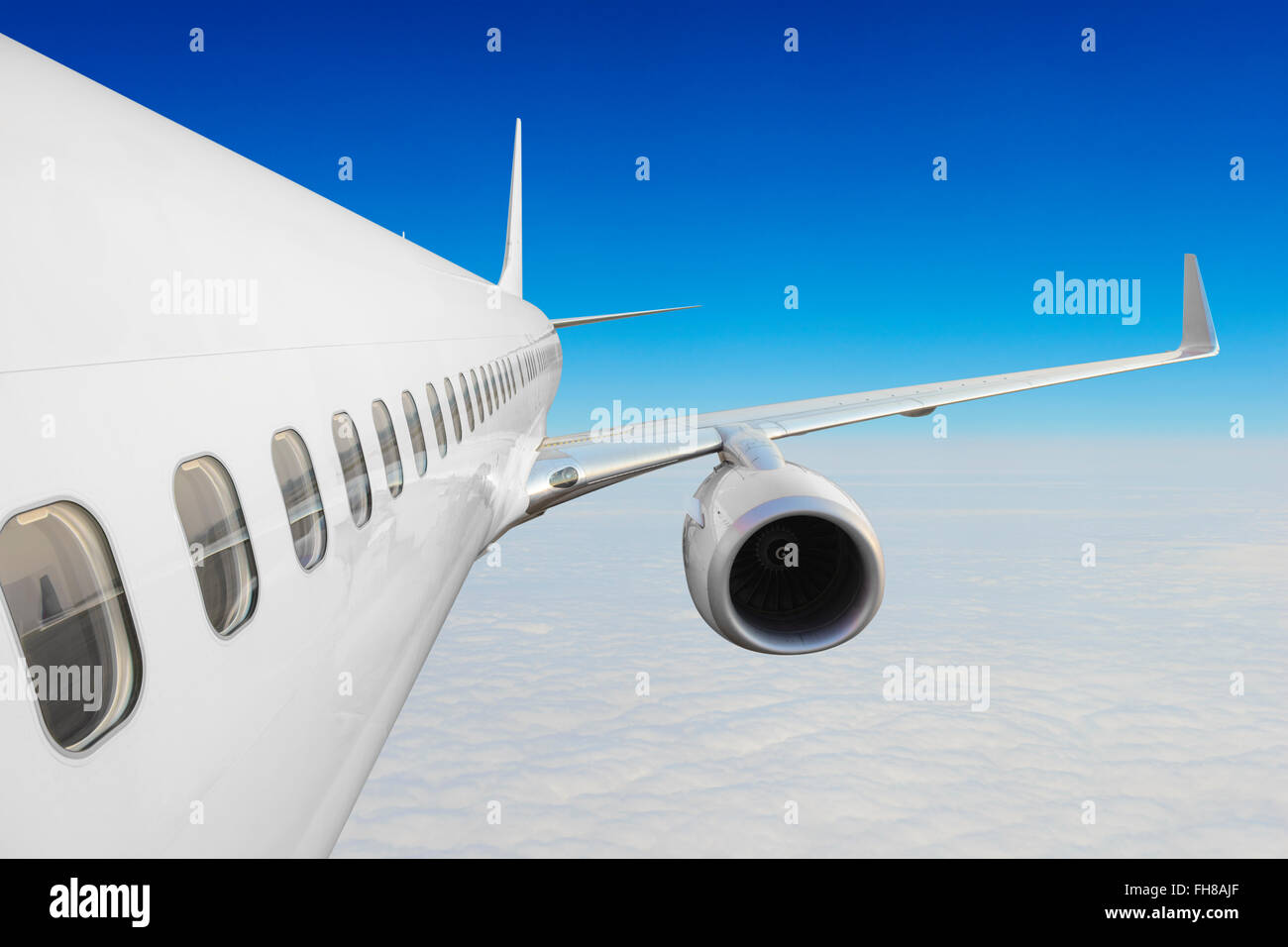 In flight commercial airplane Stock Photo - Alamy