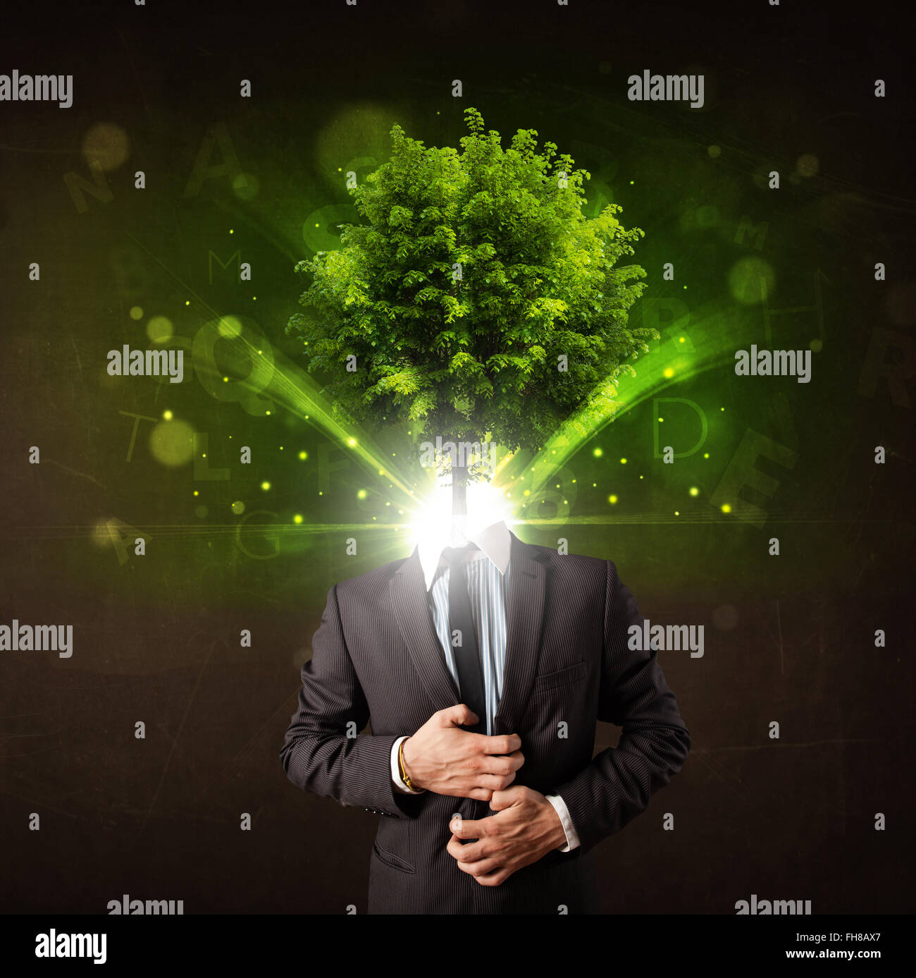 Man with green tree head concept Stock Photo - Alamy