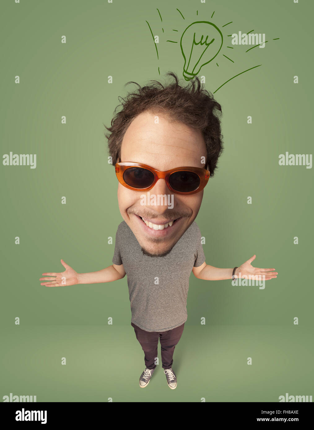Big head person with idea bulb Stock Photo - Alamy